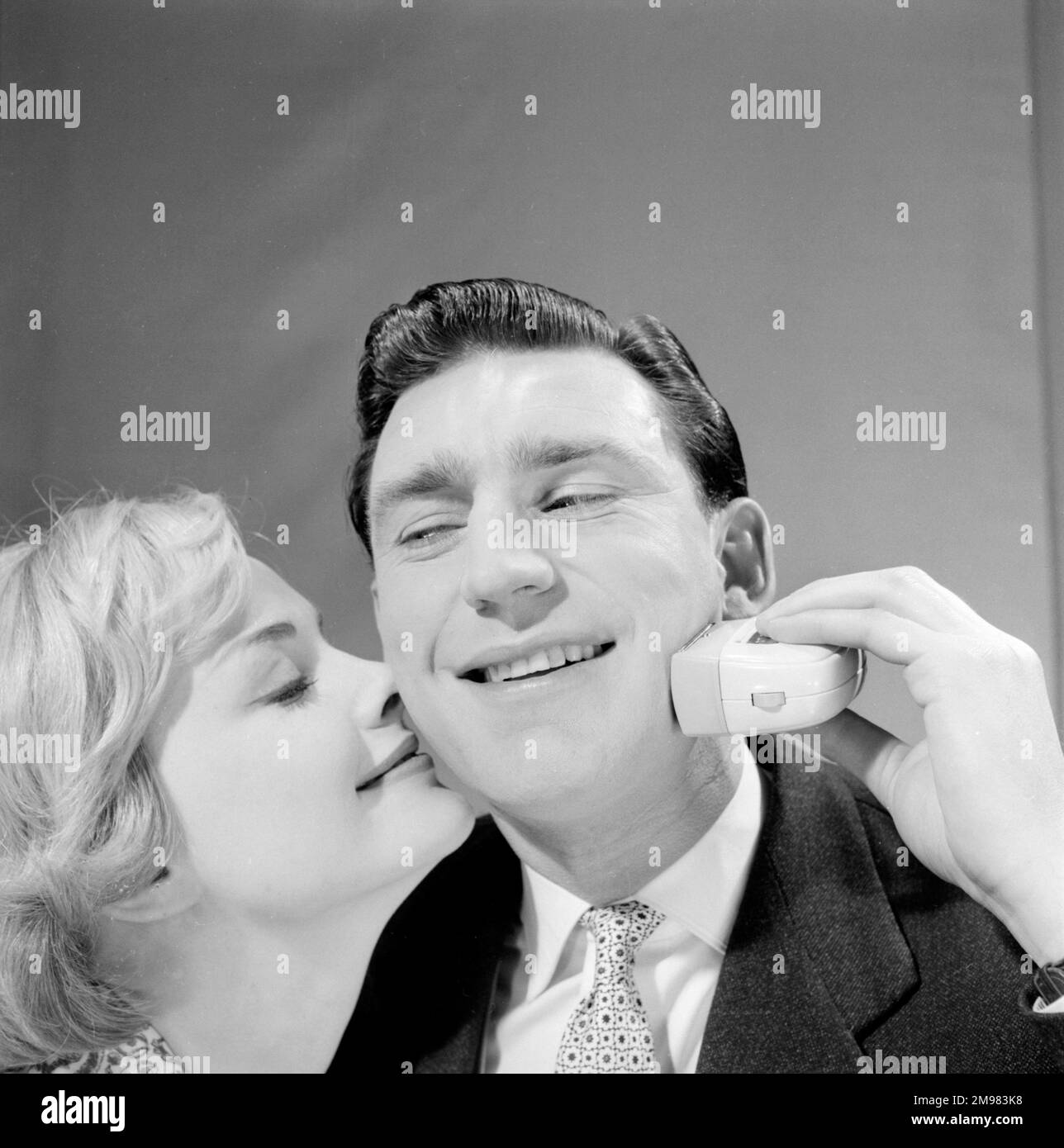 Advertisement for Remington shaver -- male and female models (Sandra ...