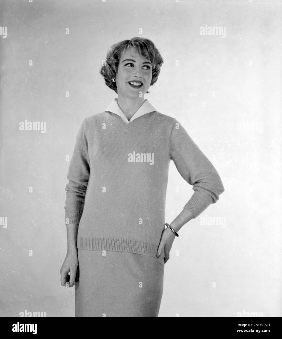 Advertisement for Vanity Fair -- female model (Susan Bayley) in jumper ...