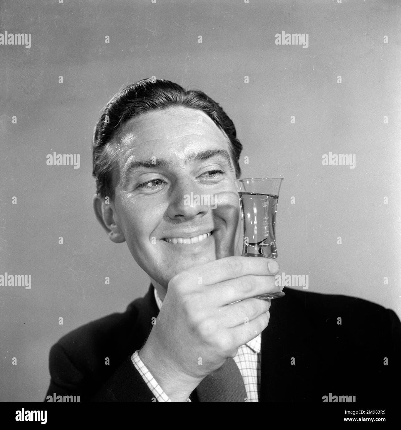 Advertisement for Emu sherry -- smiling male model (Stanley Morgan ...