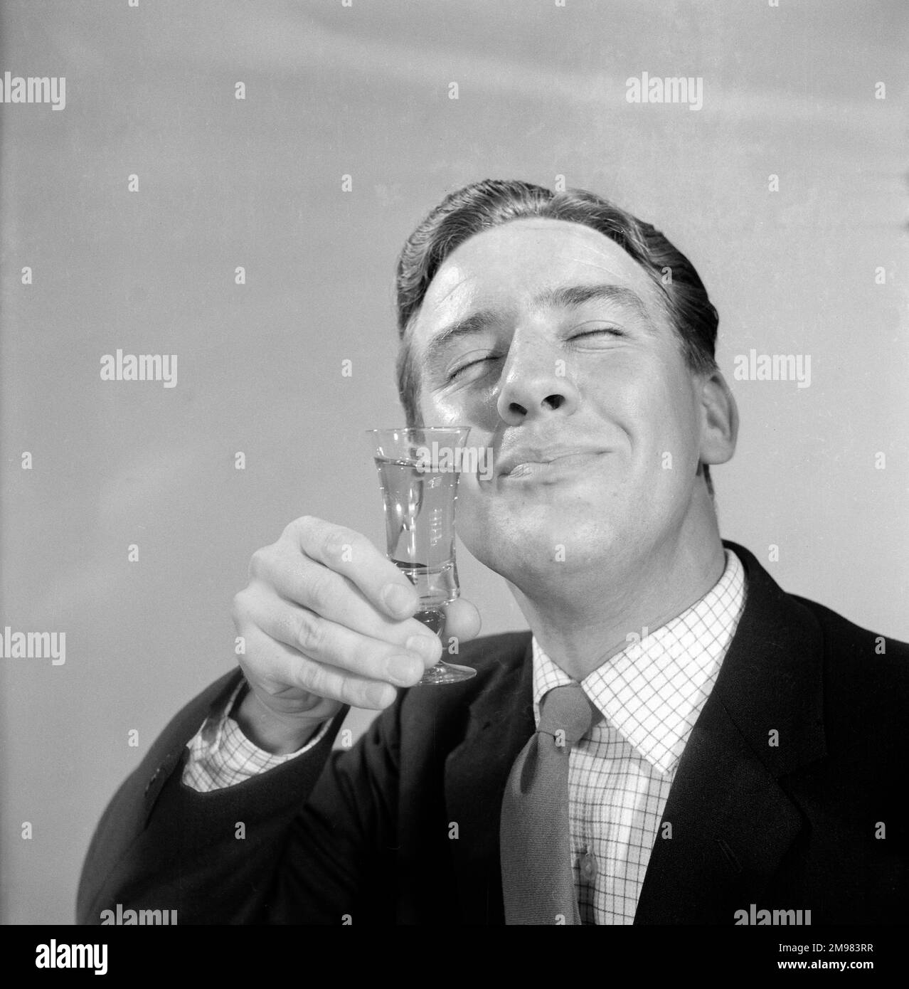 Advertisement for Emu sherry -- smiling male model (Stanley Morgan ...