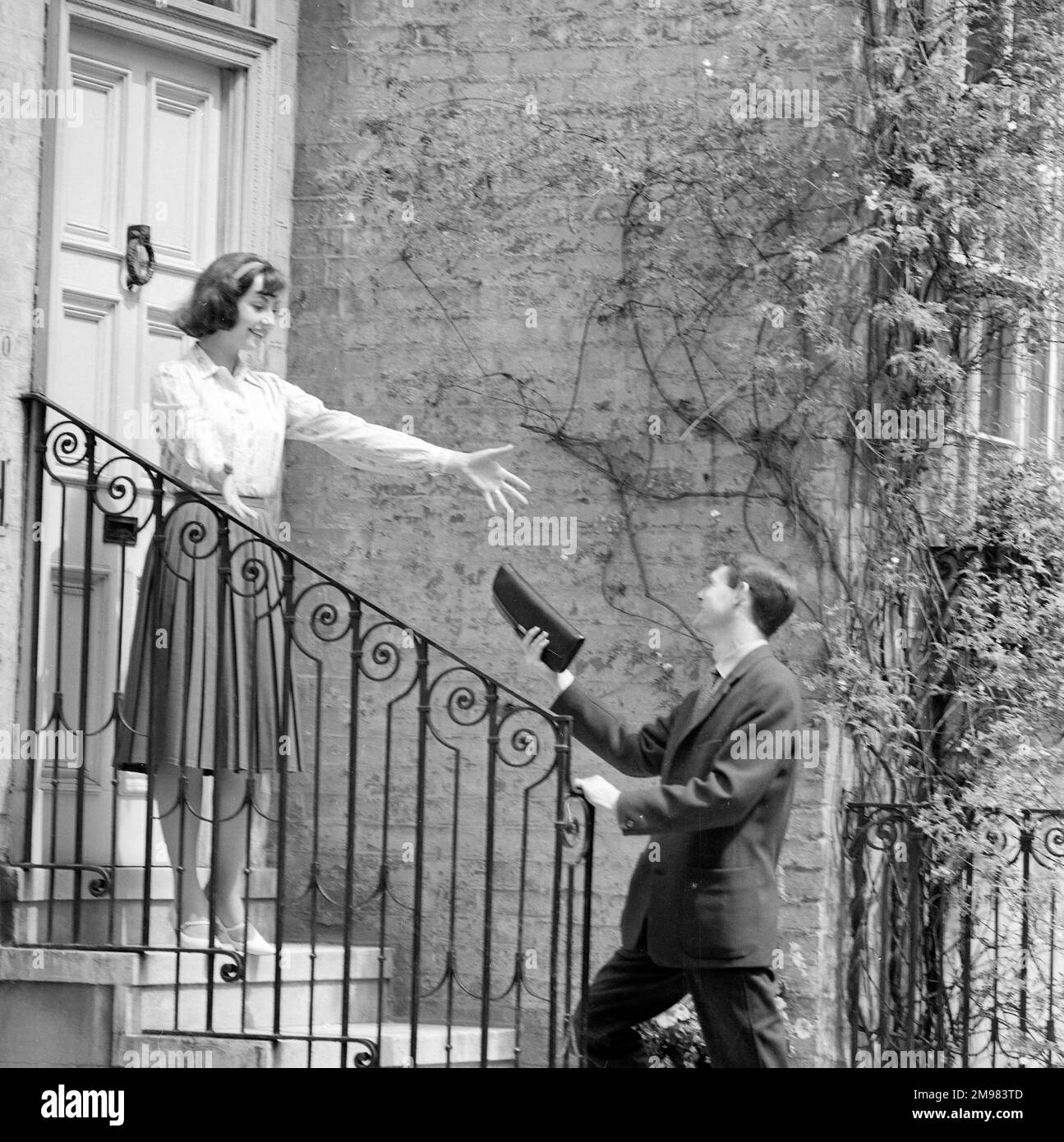 Advertisement for Cadbury's Golden Key -- male and female models (Barry ...