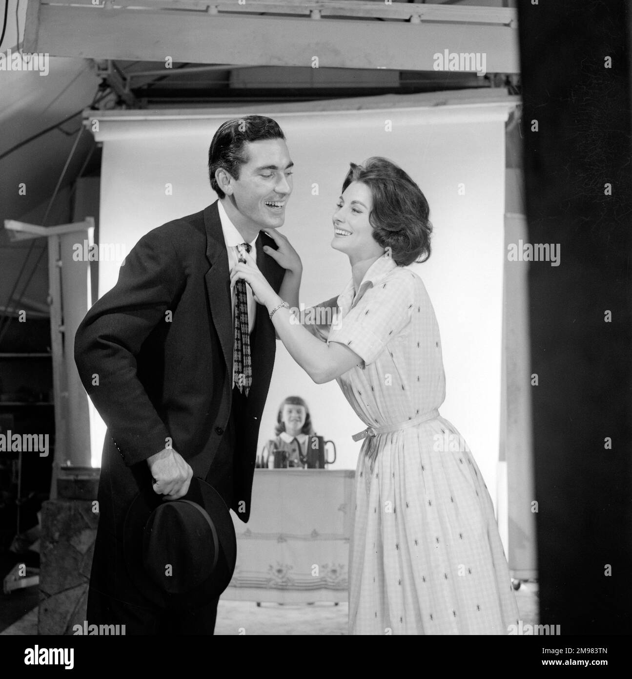 Advertisement for Nescafe -- male and female models posing Stock Photo ...