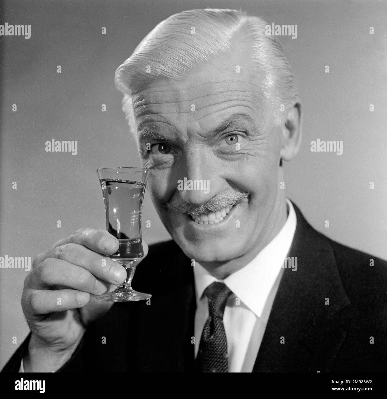 Advertisement for Emu sherry -- smiling male model (George McGrath ...