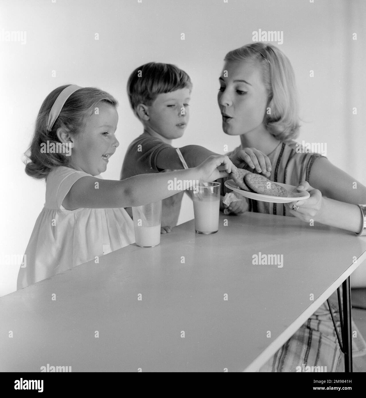 Advertisement for McVitie biscuits -- models posing as mother and two ...