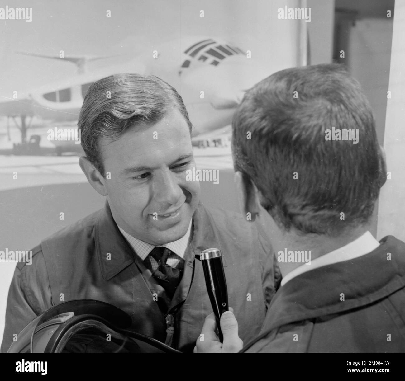 Advertisement for Silvikrin hair products -- two male models posing ...