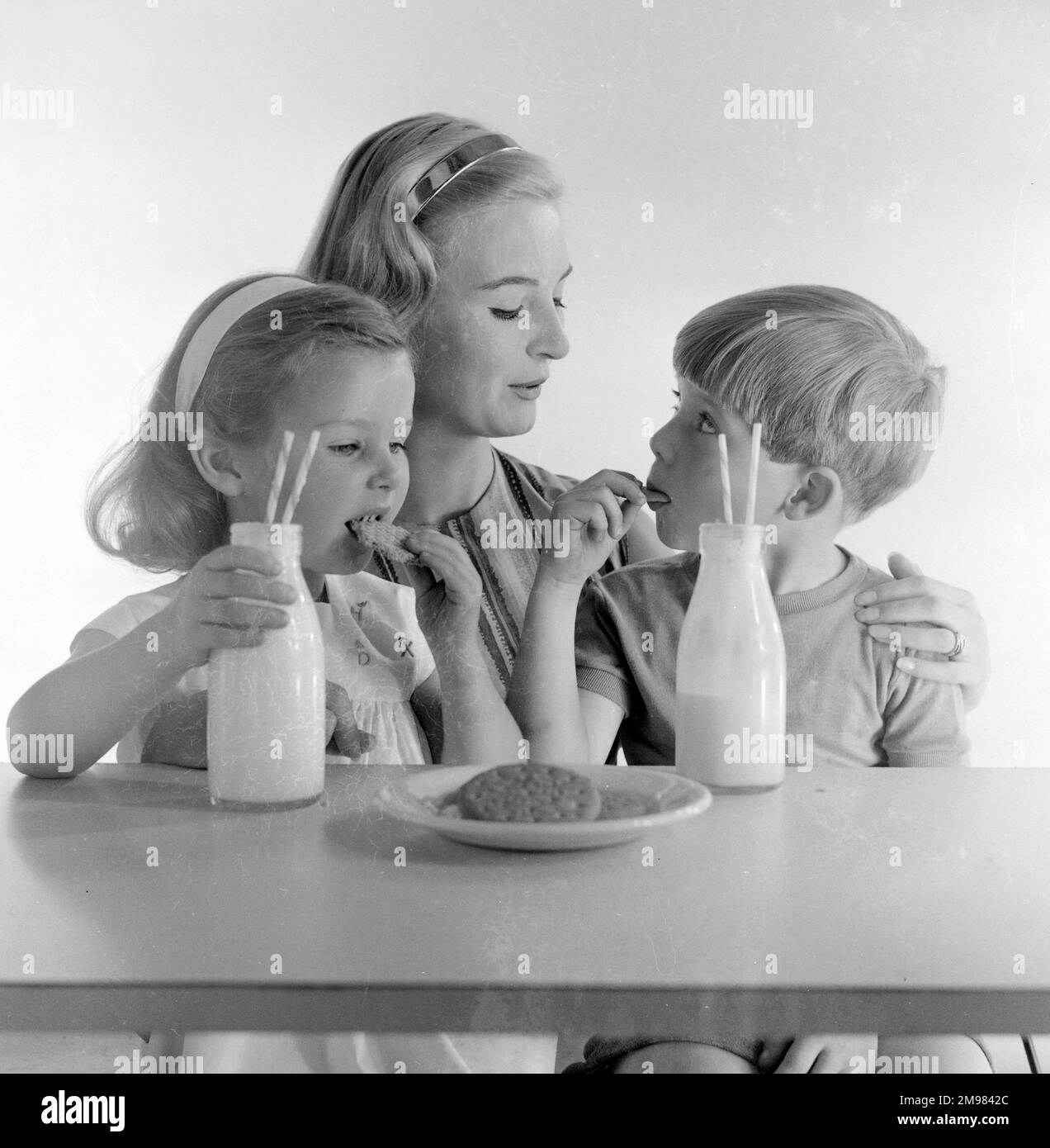 Advertisement for McVitie biscuits -- models posing as mother and two ...