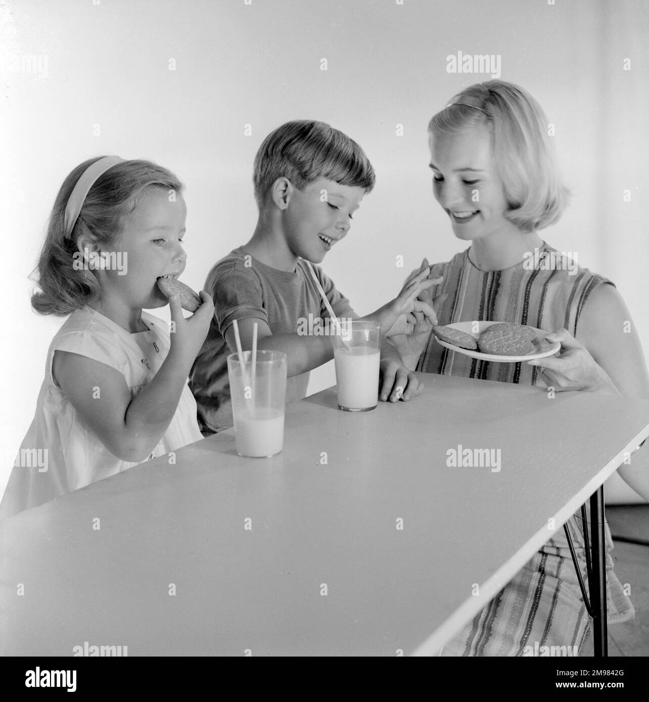 Advertisement for McVitie biscuits -- models posing as mother and two ...