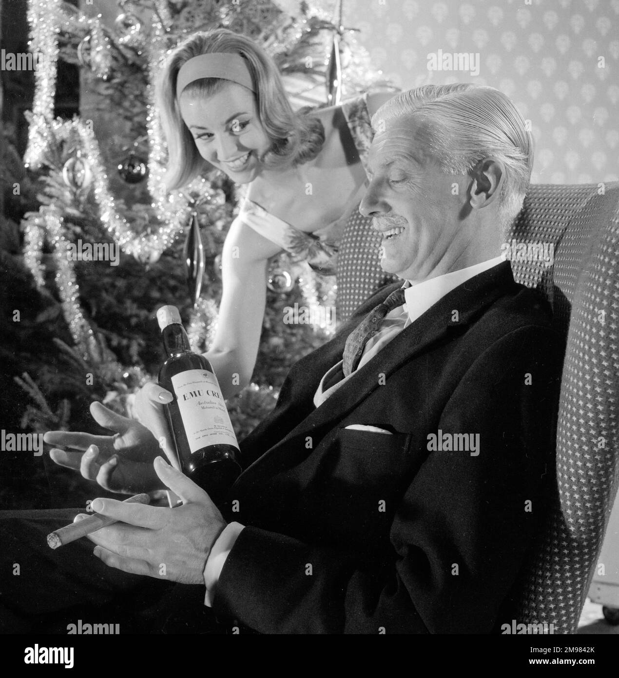 Advertisement for Emu sherry -- male and female models posing in ...