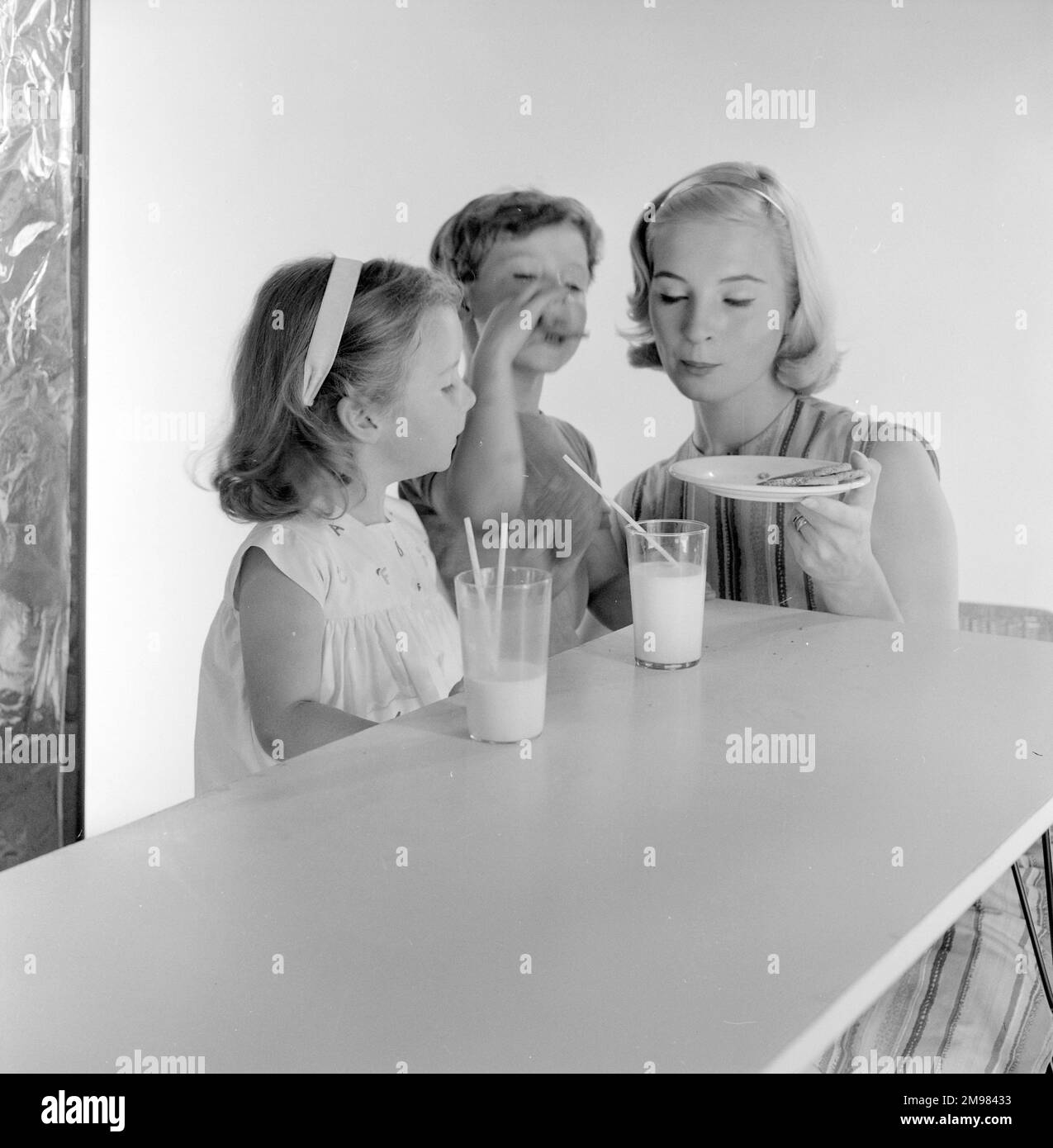 Advertisement for McVitie biscuits -- models posing as mother and two ...