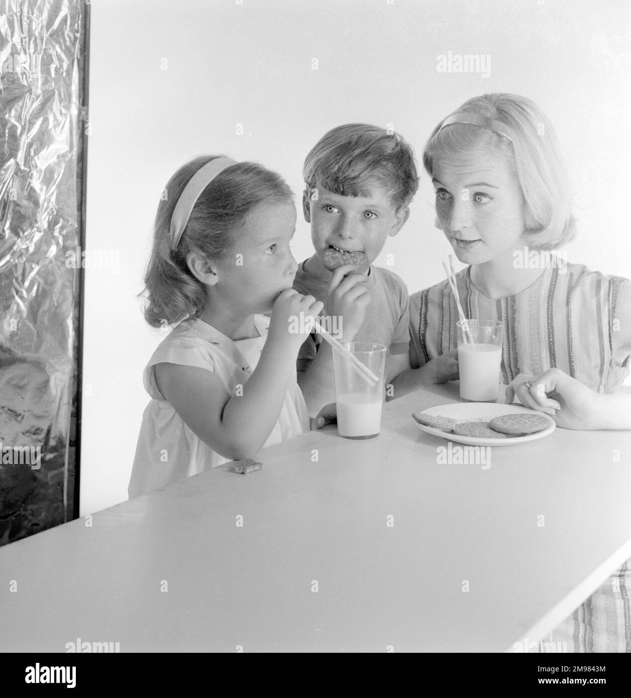 Advertisement for McVitie biscuits -- models posing as mother and two ...