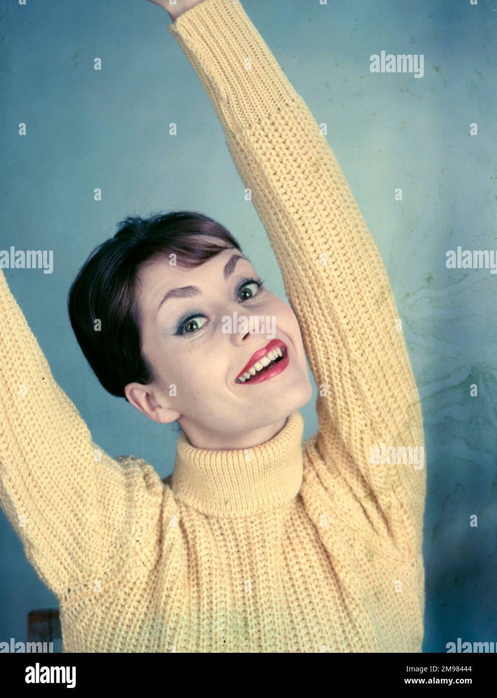 Advertisement for Pepsodent toothpaste -- female model wearing a yellow ...