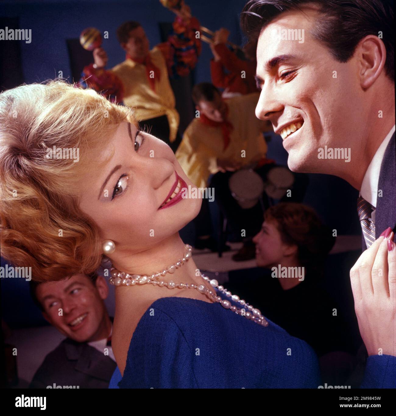 Advertisement for Nivea cream -- man (Peter Anthony) and woman dancing ...