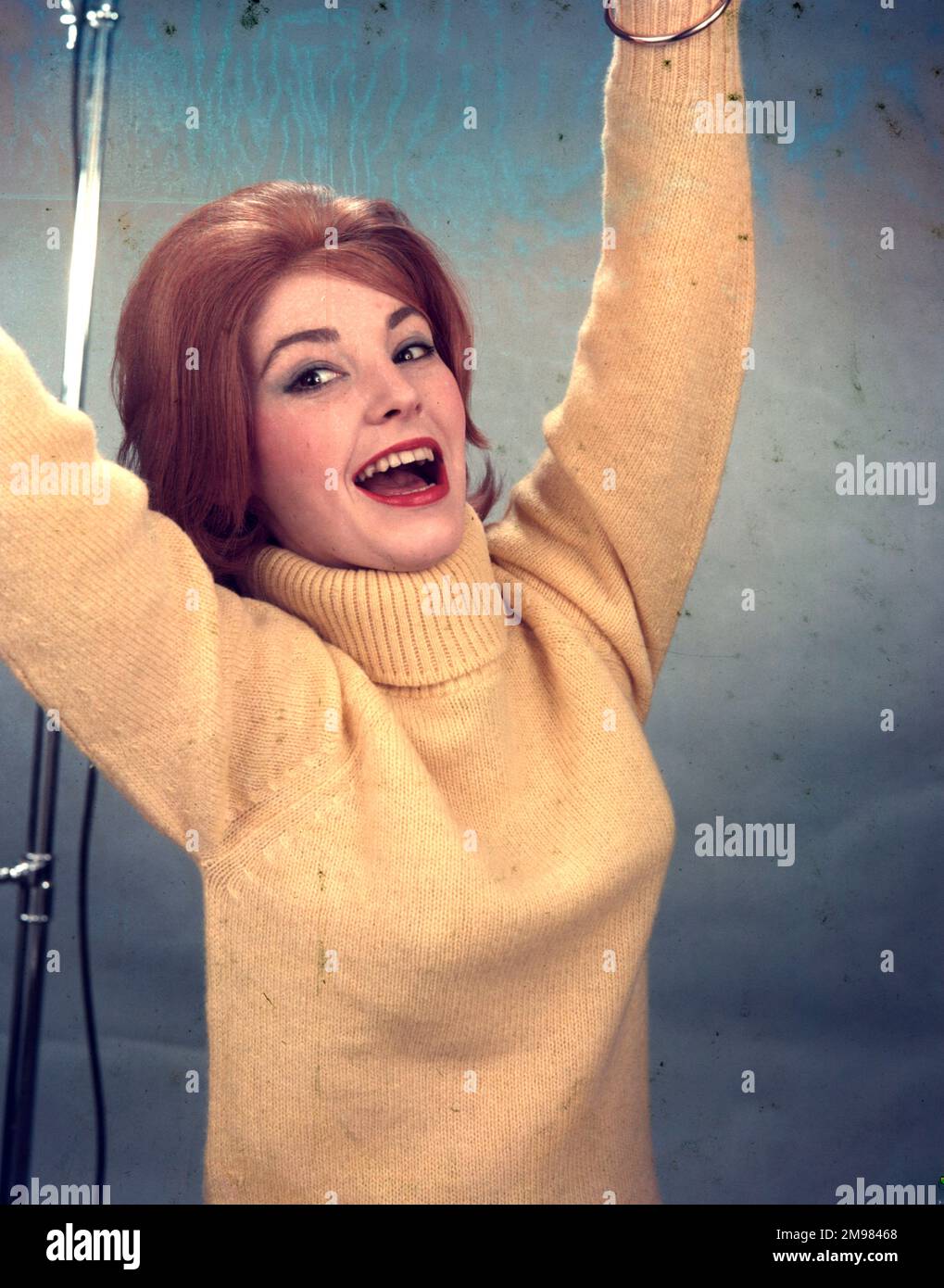 Advertisement for Pepsodent toothpaste -- female model wearing a yellow ...