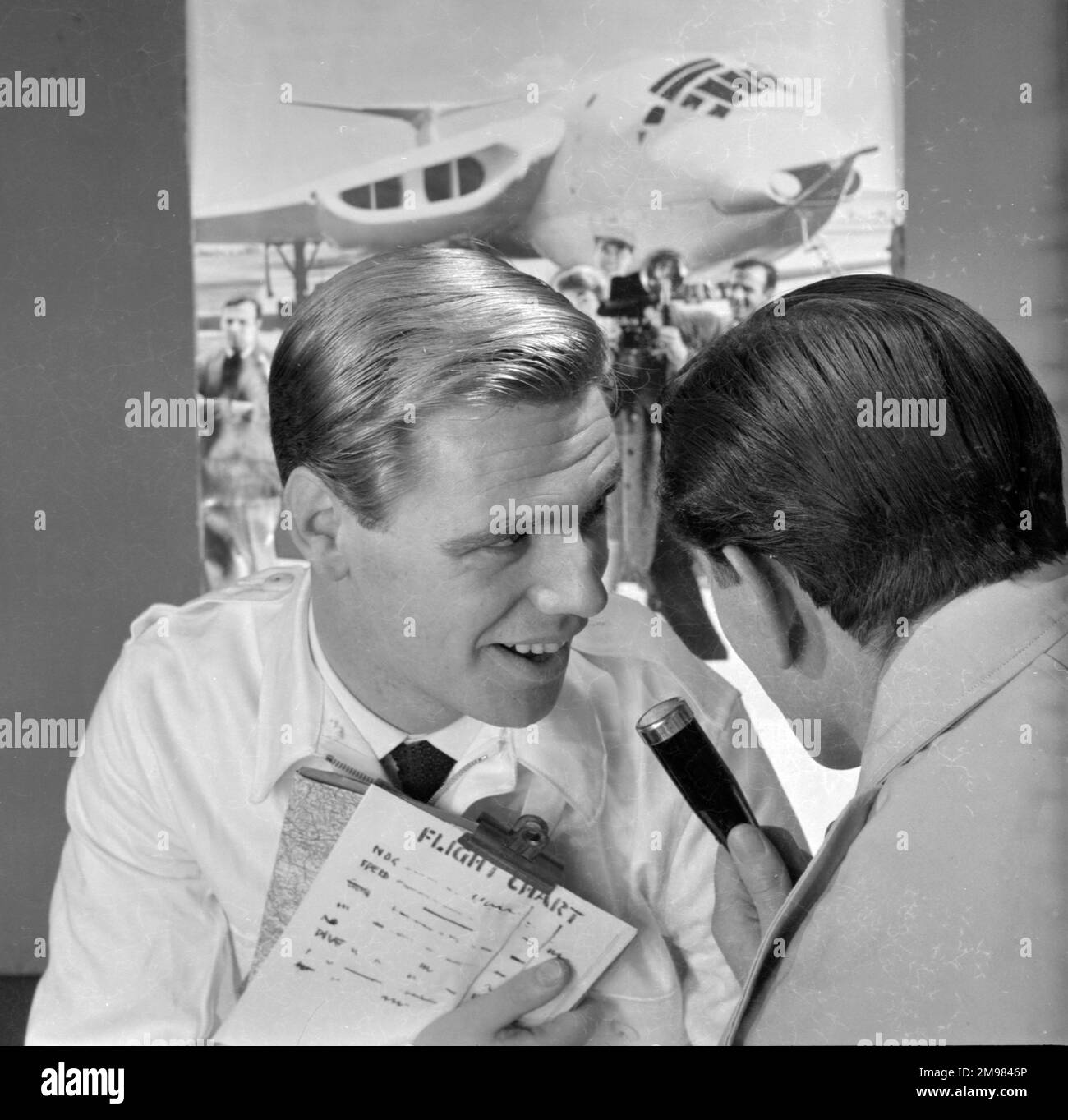 Advertisement for Silvikrin hair products -- two male models posing (D ...