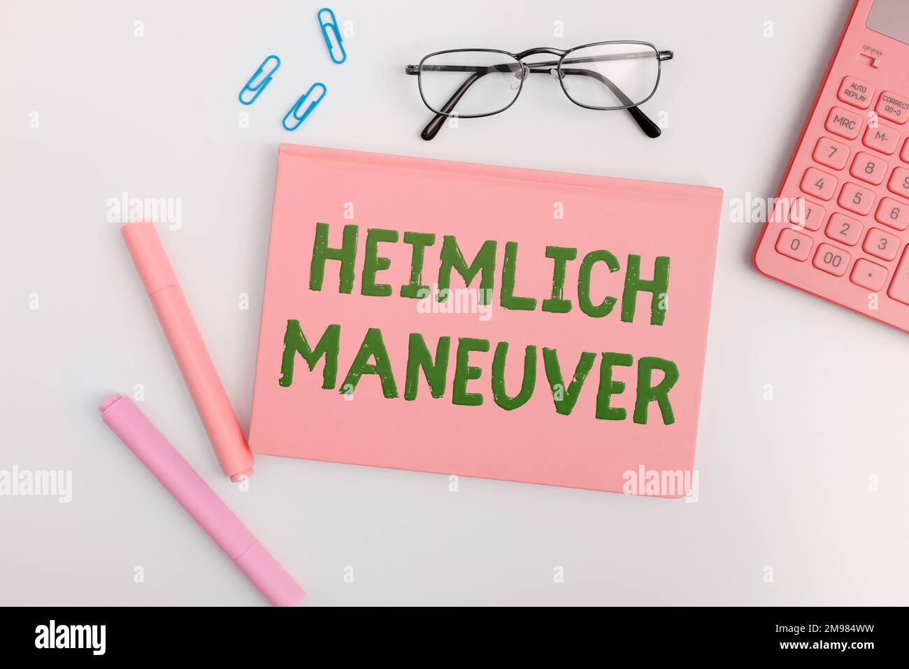 Conceptual caption Heimlich Maneuver. Word Written on application of ...