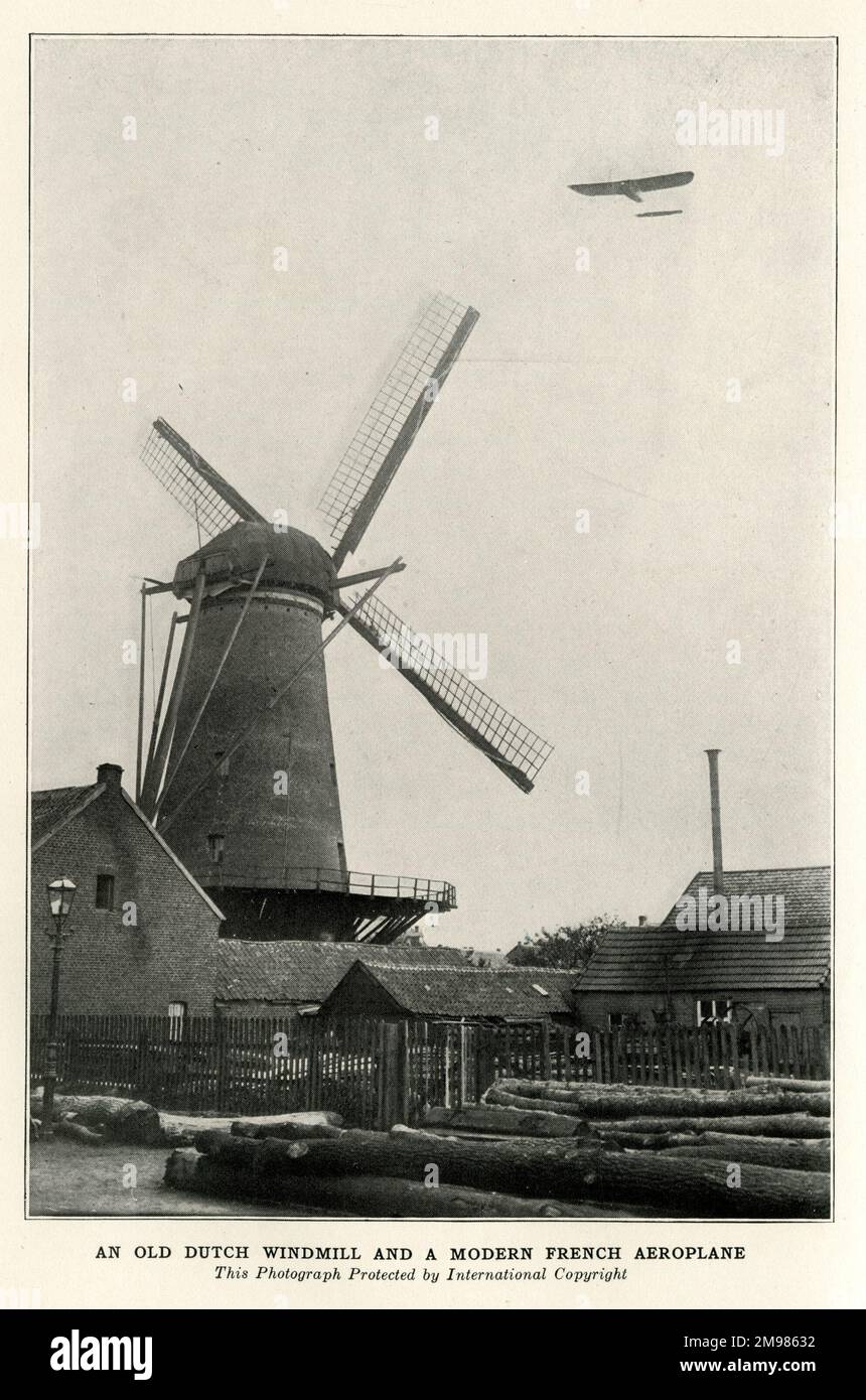 Old Dutch windmill and modern French aeroplane Stock Photo - Alamy