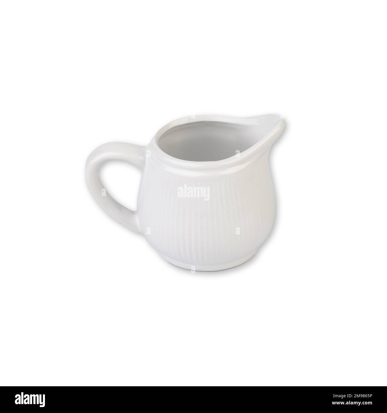White ceramic milk pitcher isolated over white background Stock Photo ...