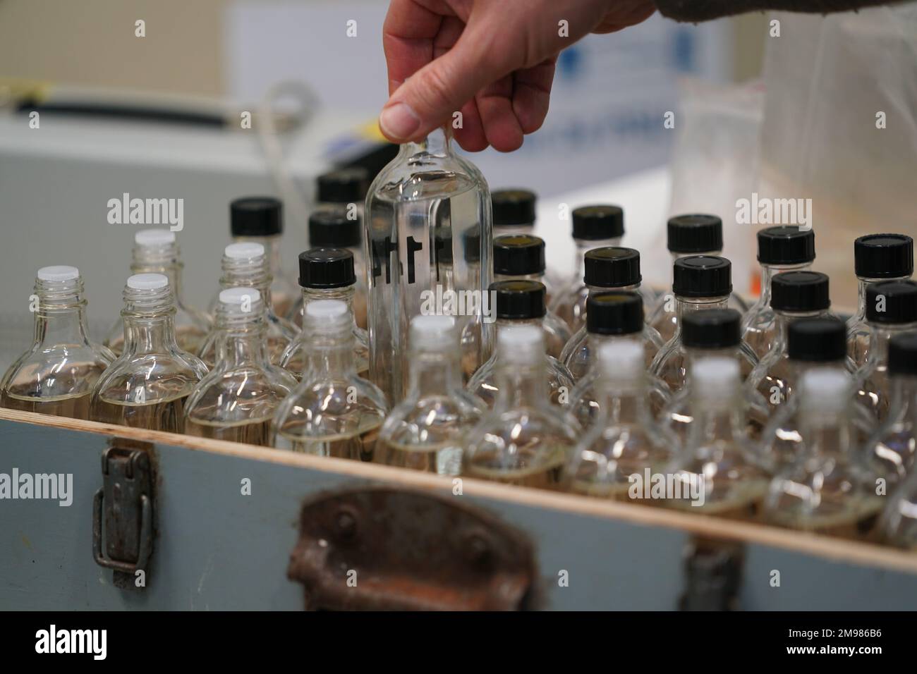 Hamburg, Germany. 17th Jan, 2023. An employee places a saltwater sample ...