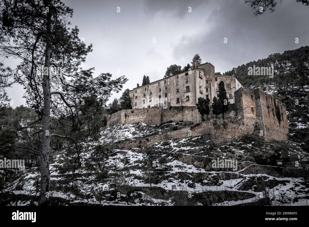 Snowy landscape with the sanctuary of Our Lady of Agres in the ...