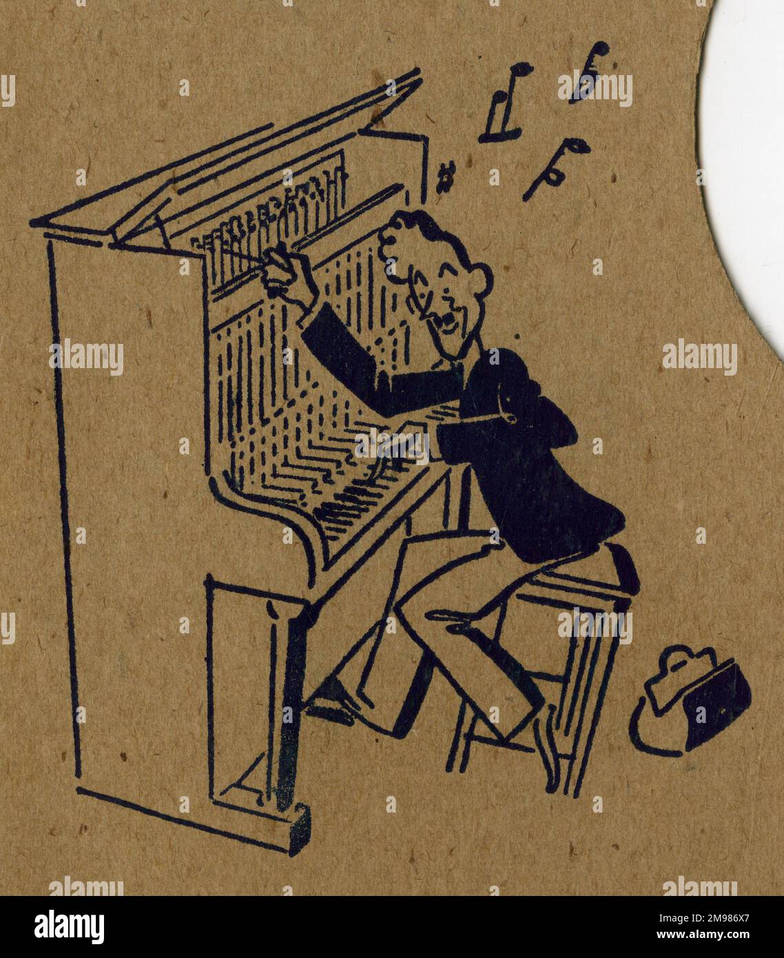 Piano tuner at work on an upright piano Stock Photo - Alamy