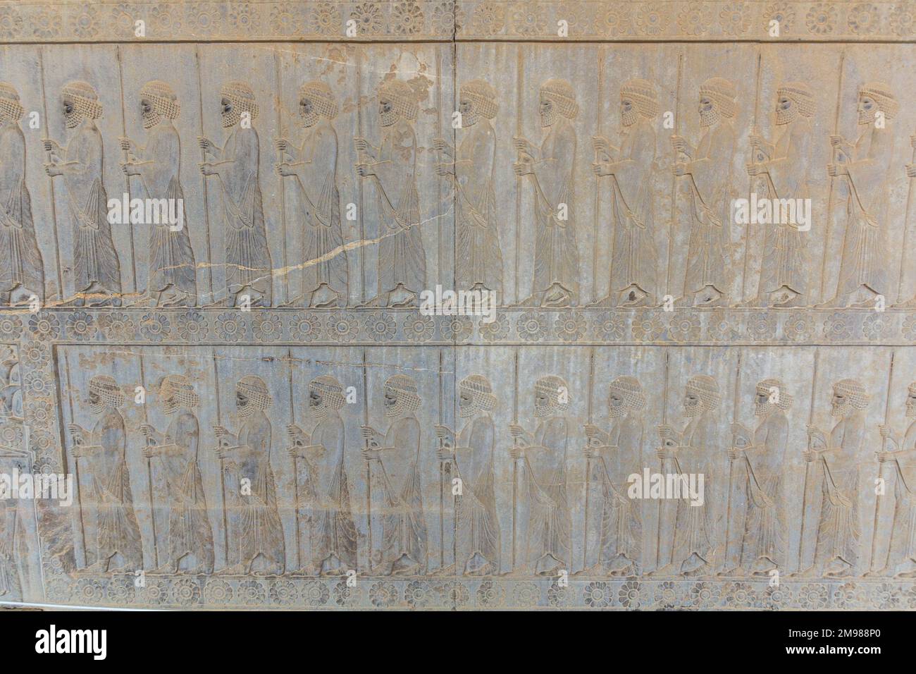 Immortal warriors bas relief in the ancient Persepolis, Iran Stock ...
