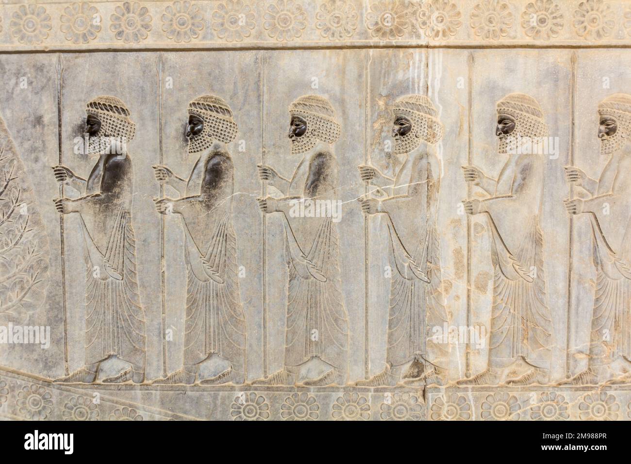 Immortal warriors bas relief in the ancient Persepolis, Iran Stock ...