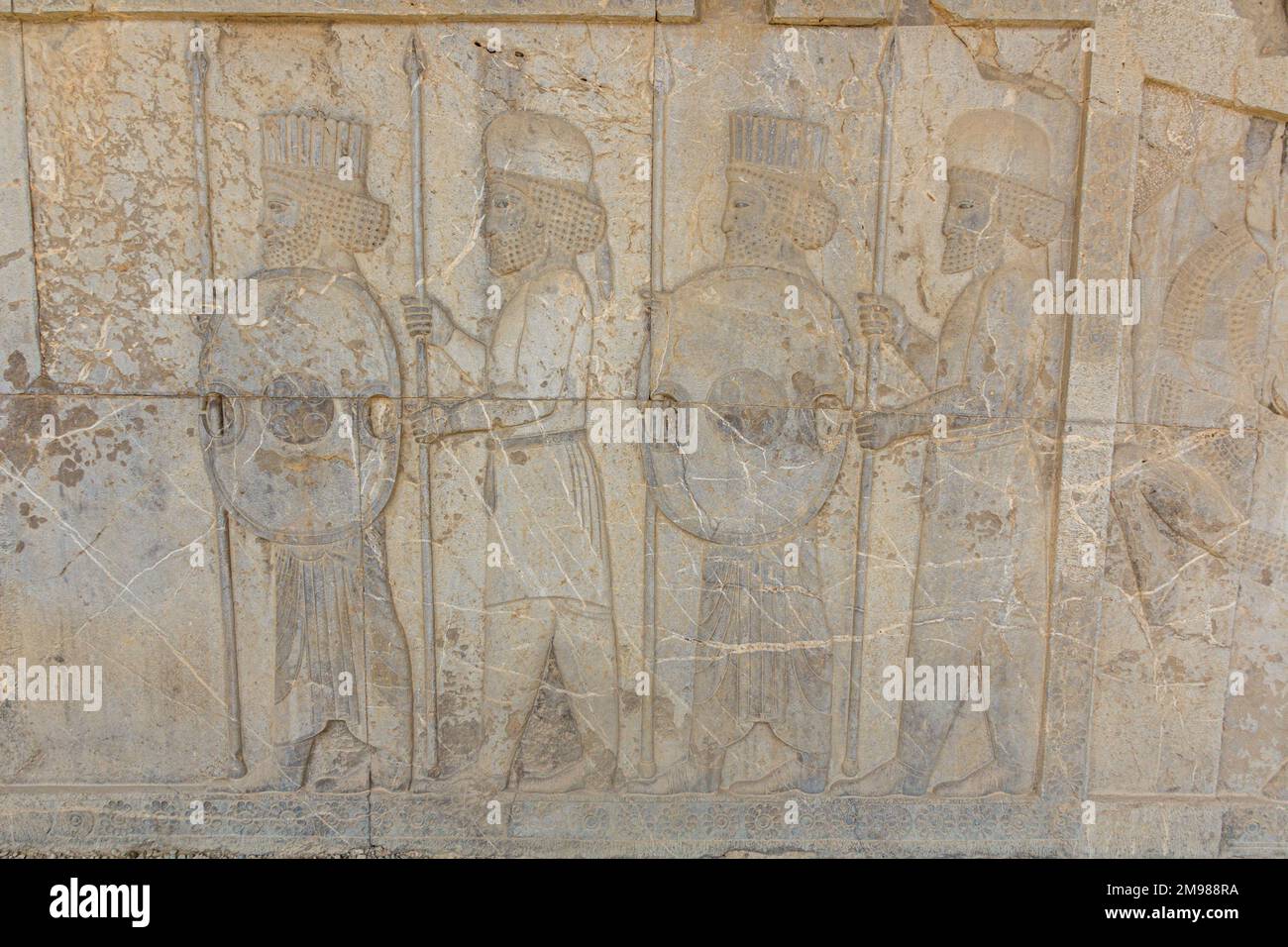 Immortal warriors bas relief in the ancient Persepolis, Iran Stock ...