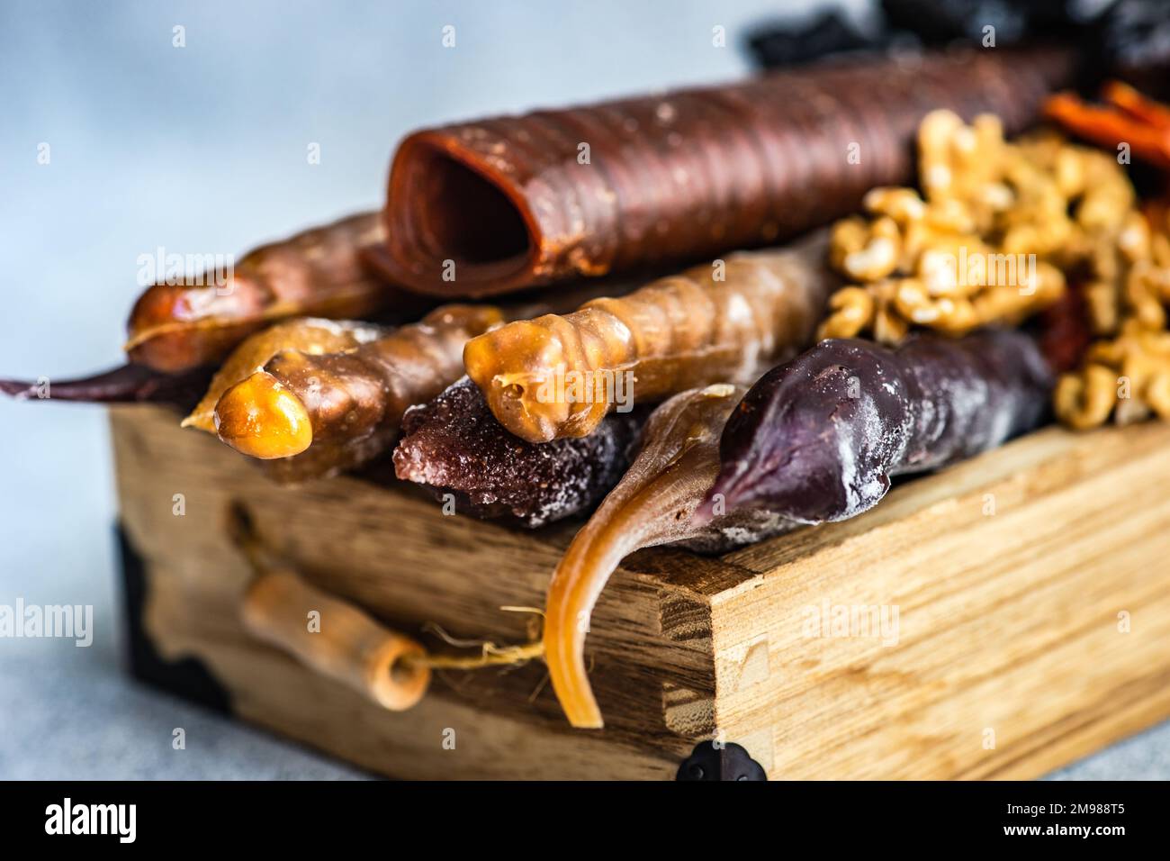 Traditional Georgian churchkhela, tklapi and gozinaki with assorted ...
