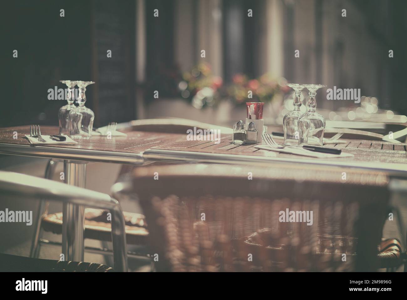 Empty table setting at an outdoor cafe table in summer, France Stock ...