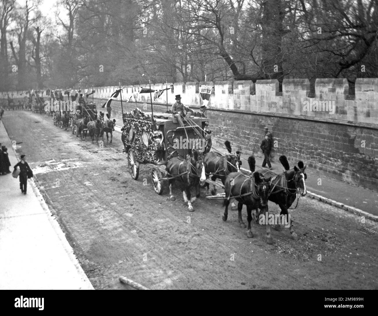 Circus troupe procession with horse-drawn carriages Stock Photo - Alamy