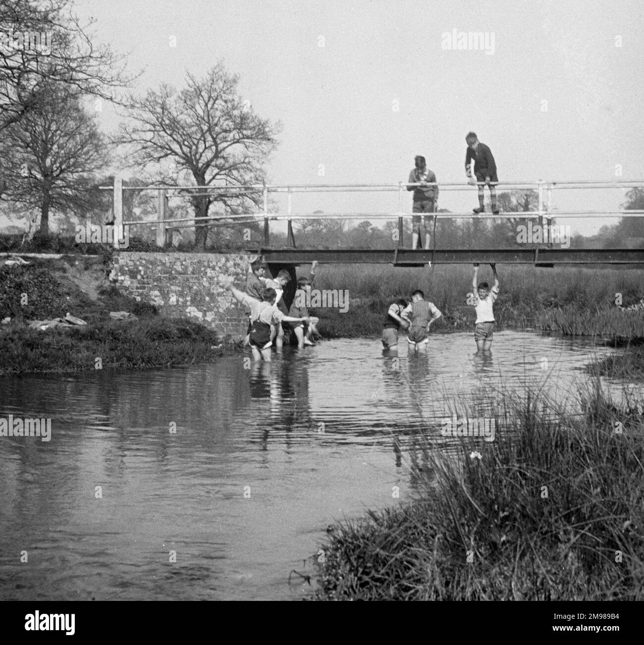 Children on bridge Black and White Stock Photos & Images - Alamy