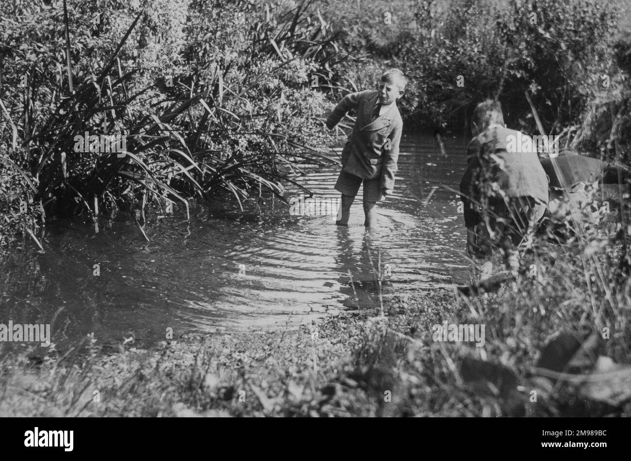 Stream children Black and White Stock Photos & Images - Alamy