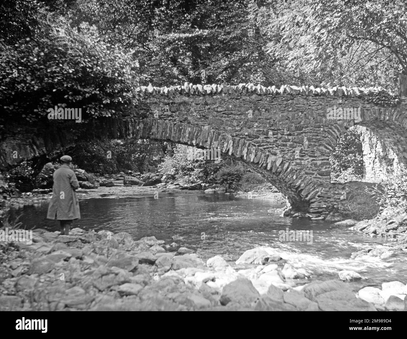 Standing with cap Black and White Stock Photos & Images - Alamy