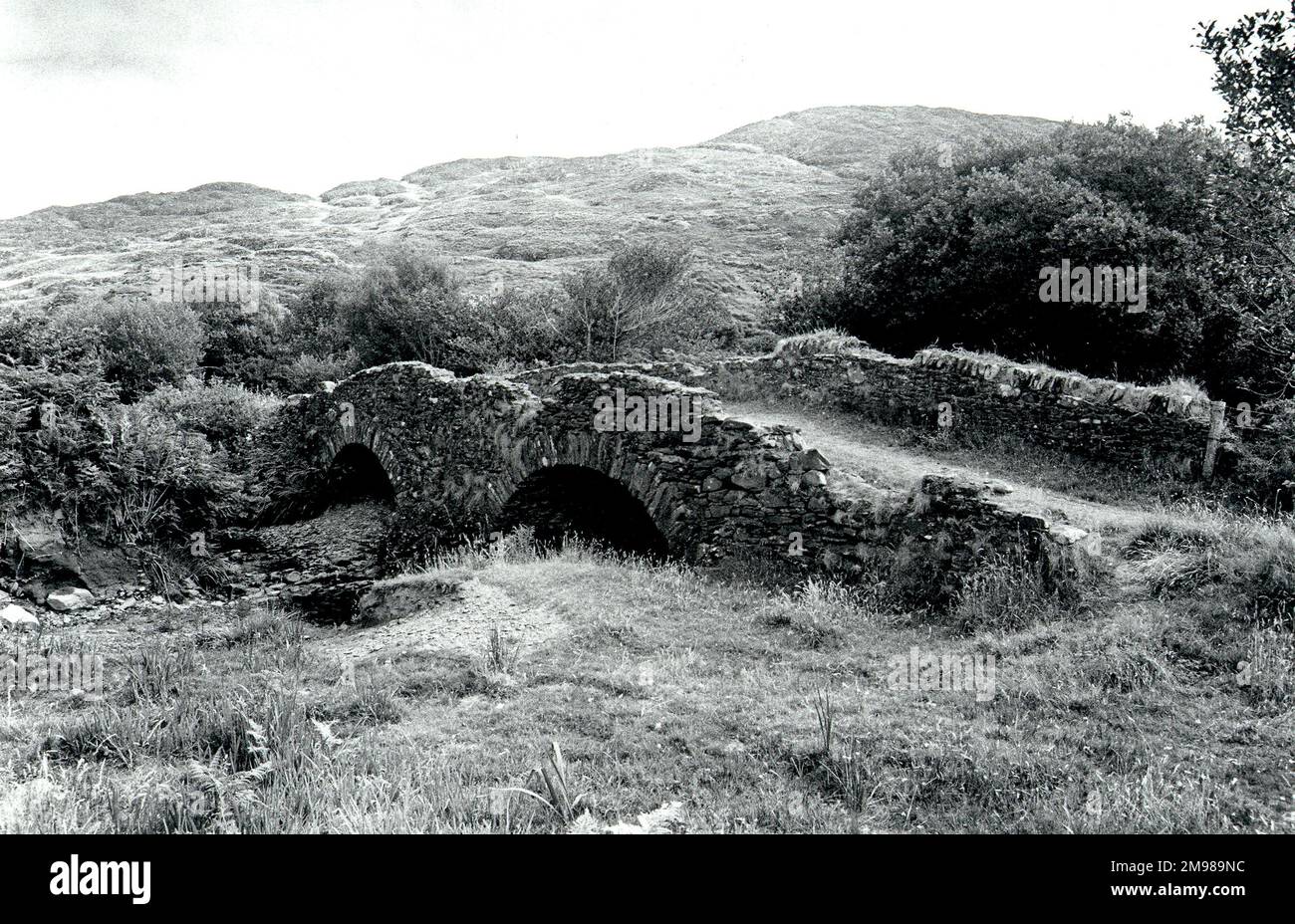Ruined stone bridge on The Ring of Kerry, County Kerry, south-west ...