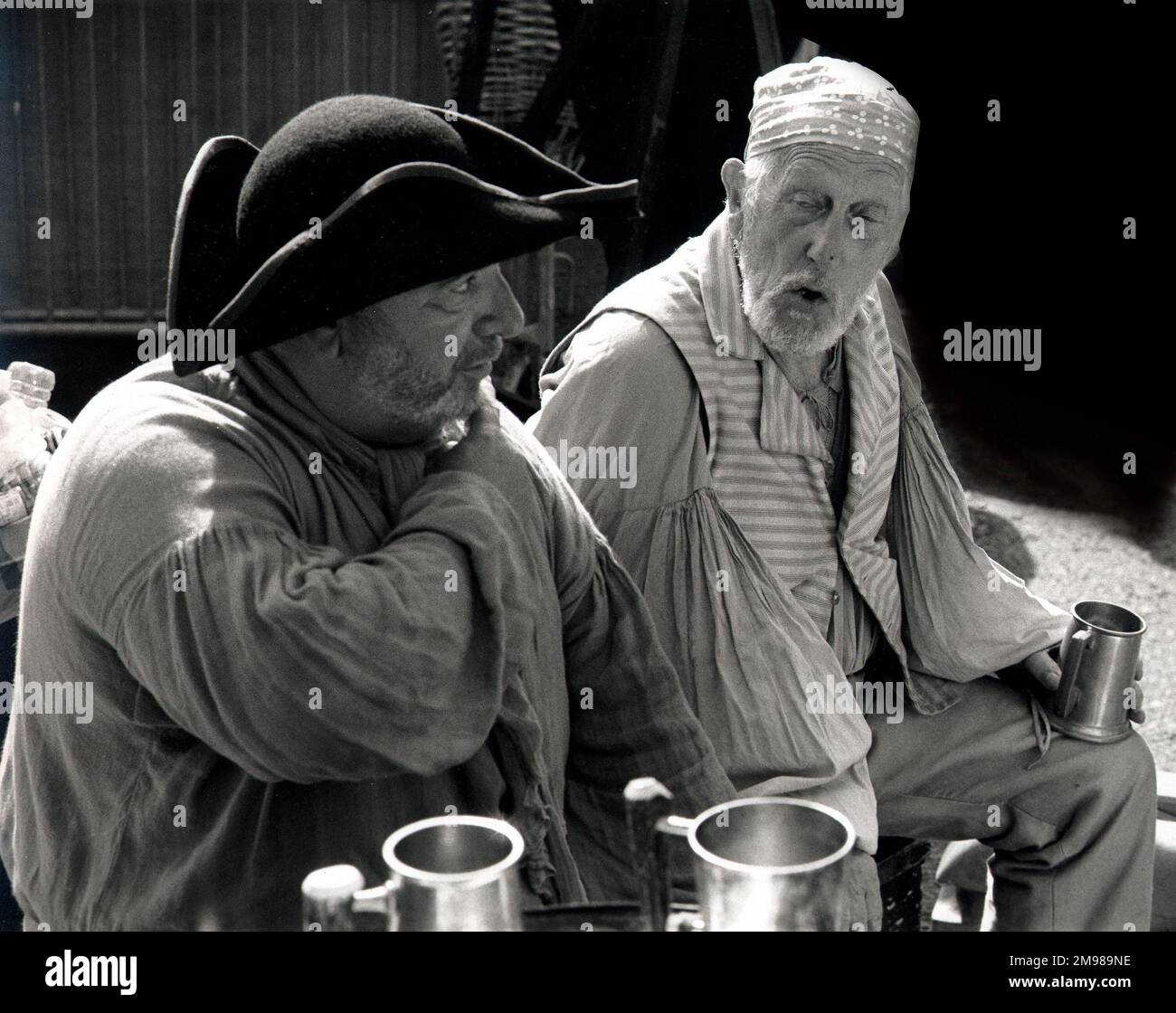 Two men in pirate or sailor costume with beer tankards, Portsmouth ...