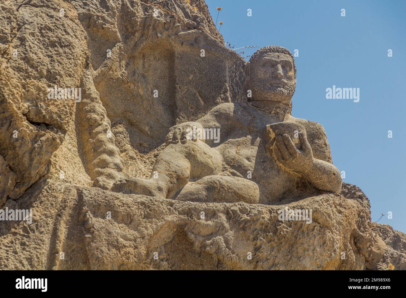 Ancient statue of Hercules in Bisotun, Iran Stock Photo - Alamy