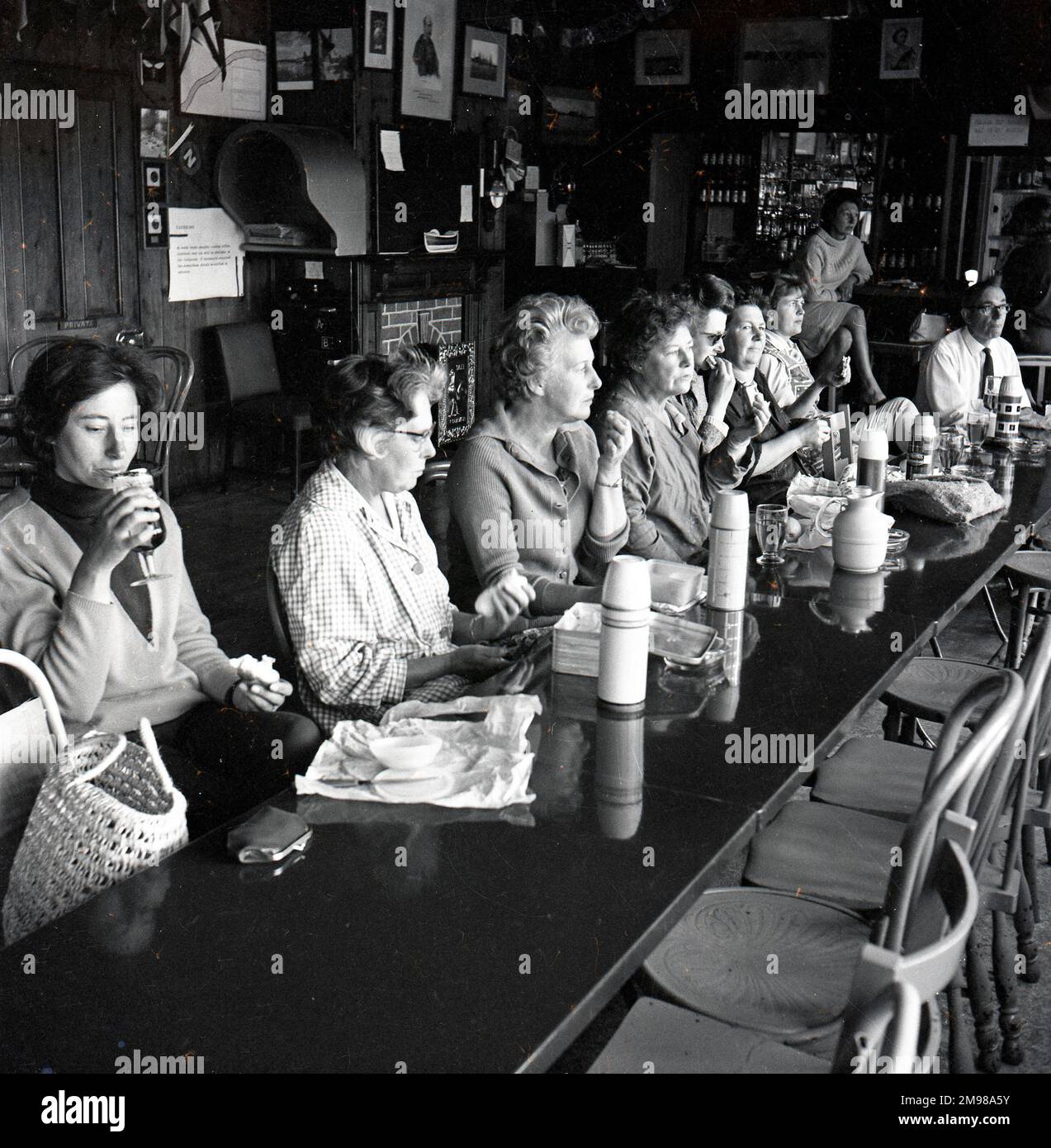 A coach party stops for lunch in a pub Stock Photo - Alamy
