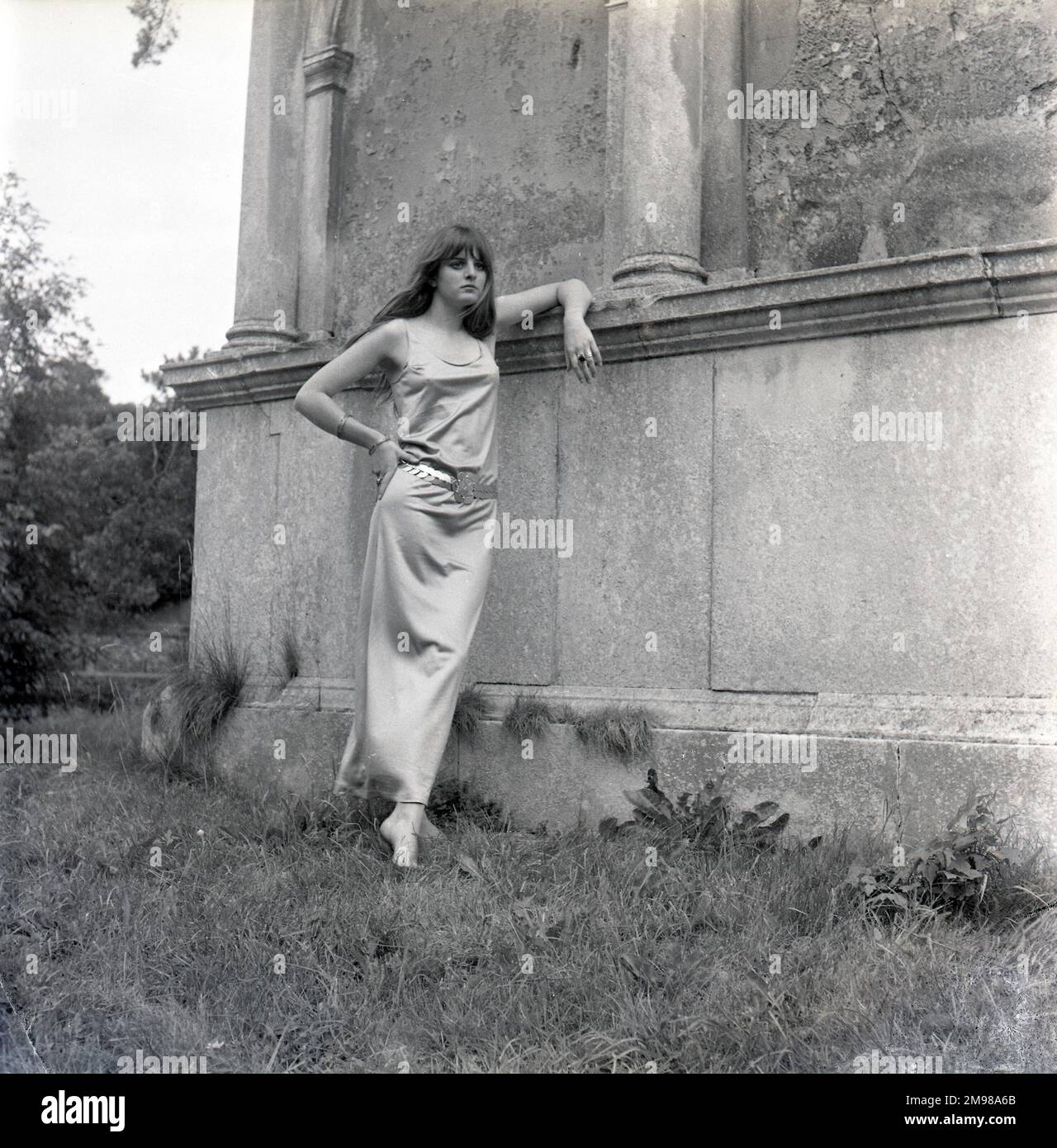Model posing in a graveyard Stock Photo - Alamy
