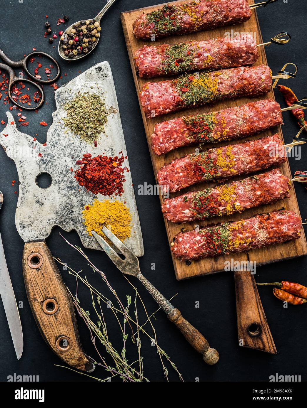 Raw kebab with spices Stock Photo - Alamy