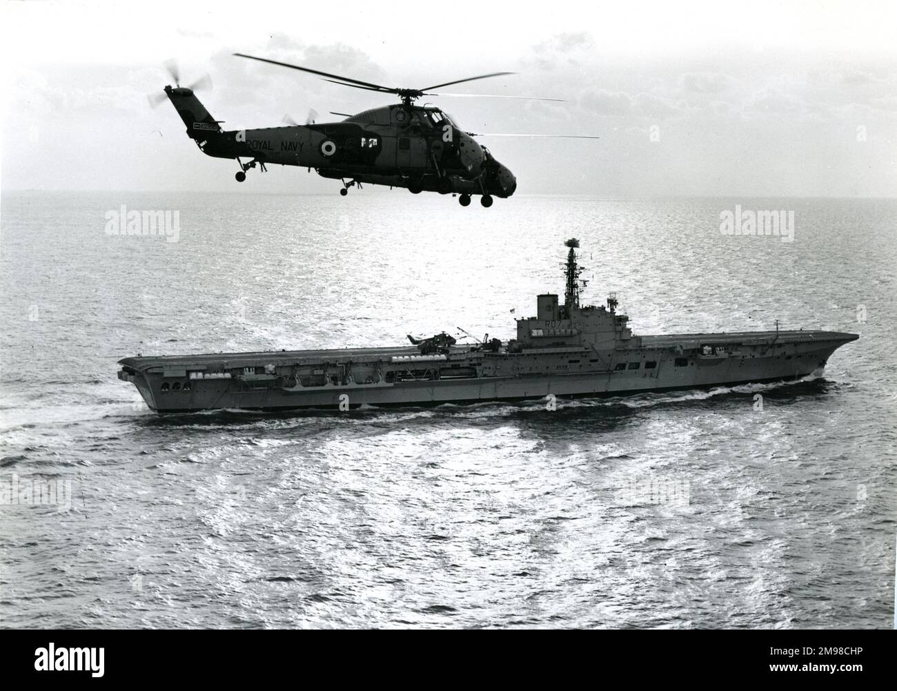 A Westland Wessex flies over HMS Albion (R07 Stock Photo - Alamy