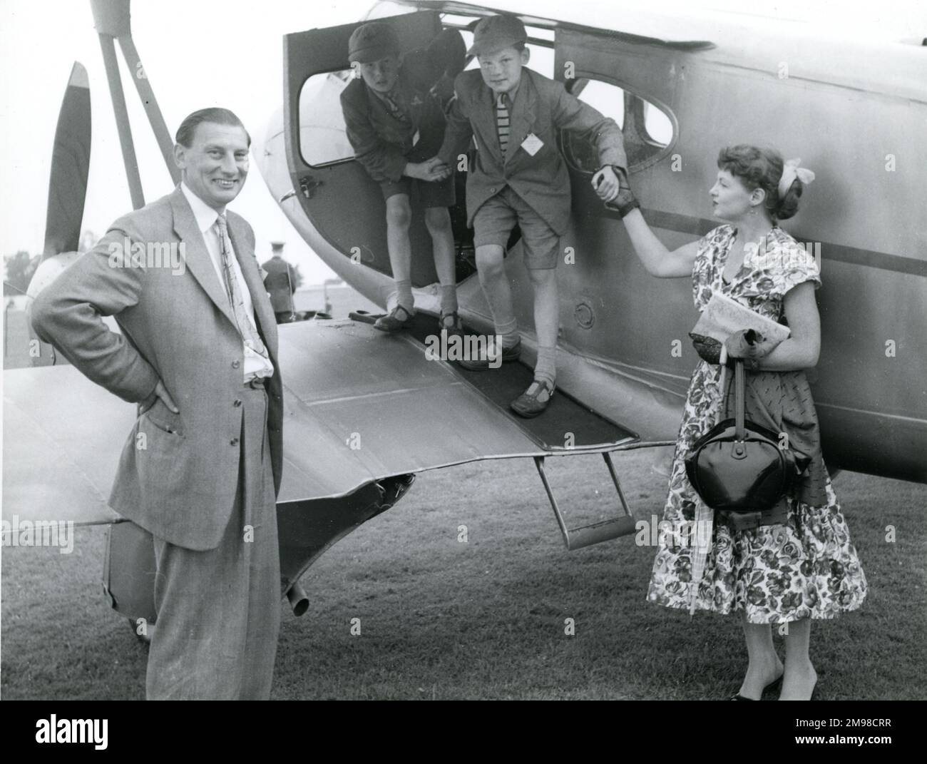 Two young lads check out de Havilland DH90A Dragonfly, G-AEWZ, of ...