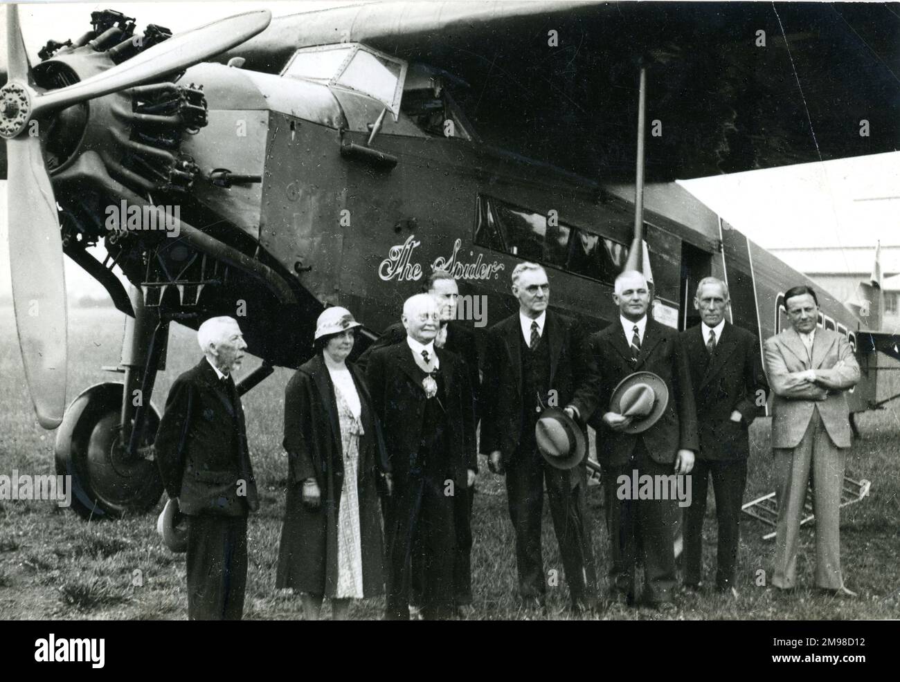 Capt C.D. Barnard, fourth from left, pilot, in front of Fokker FVII, G ...
