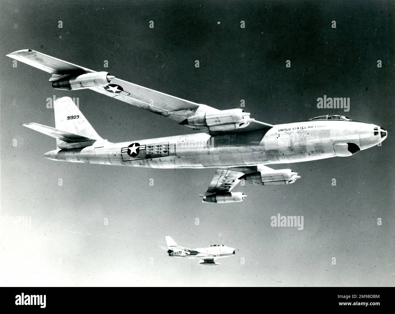 Boeing B-47A Stratojet, 49-1909 with a North American sabre chase plane ...