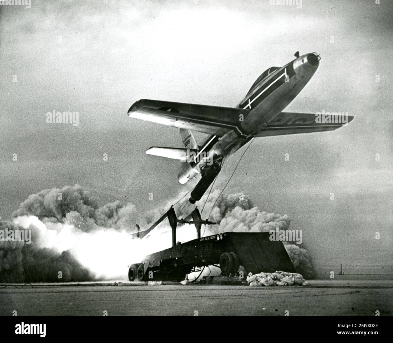 A Republic F-84 Thunderjet is launched from a Martin Aircraft zero ...
