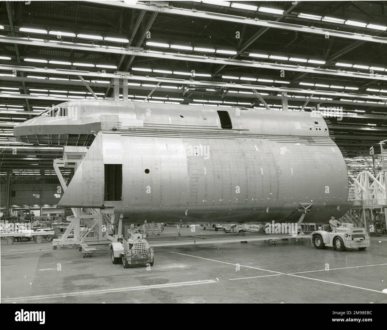 The forward fuselage of the first Lockheed C-5A Galaxy is moved to the ...