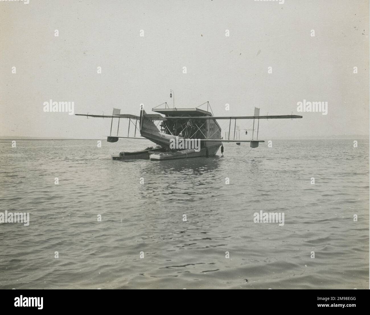 A Curtiss H12 Large America in a towing lighter adapted to be a ...