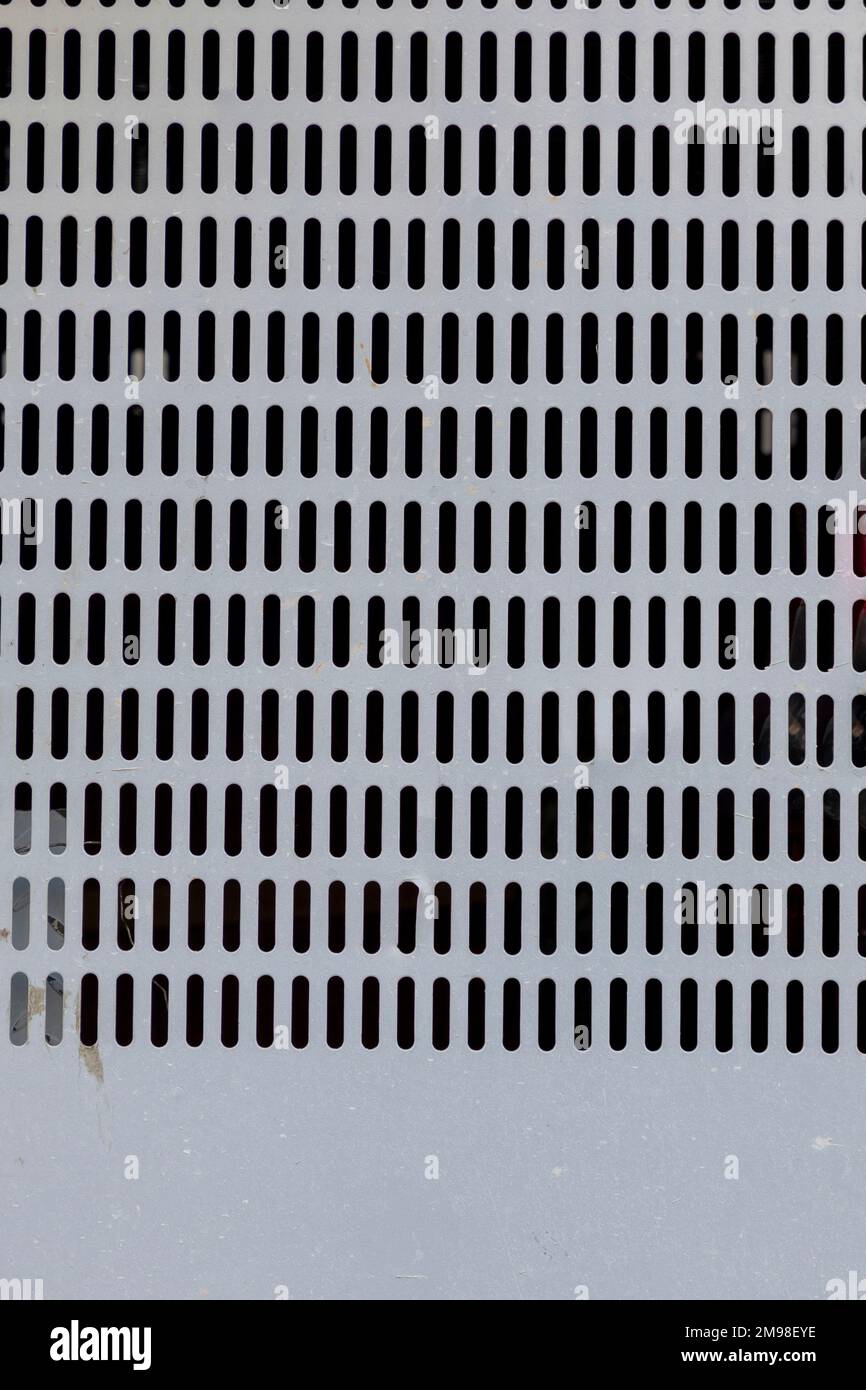 Perforated gray laminate texture and background Stock Photo - Alamy