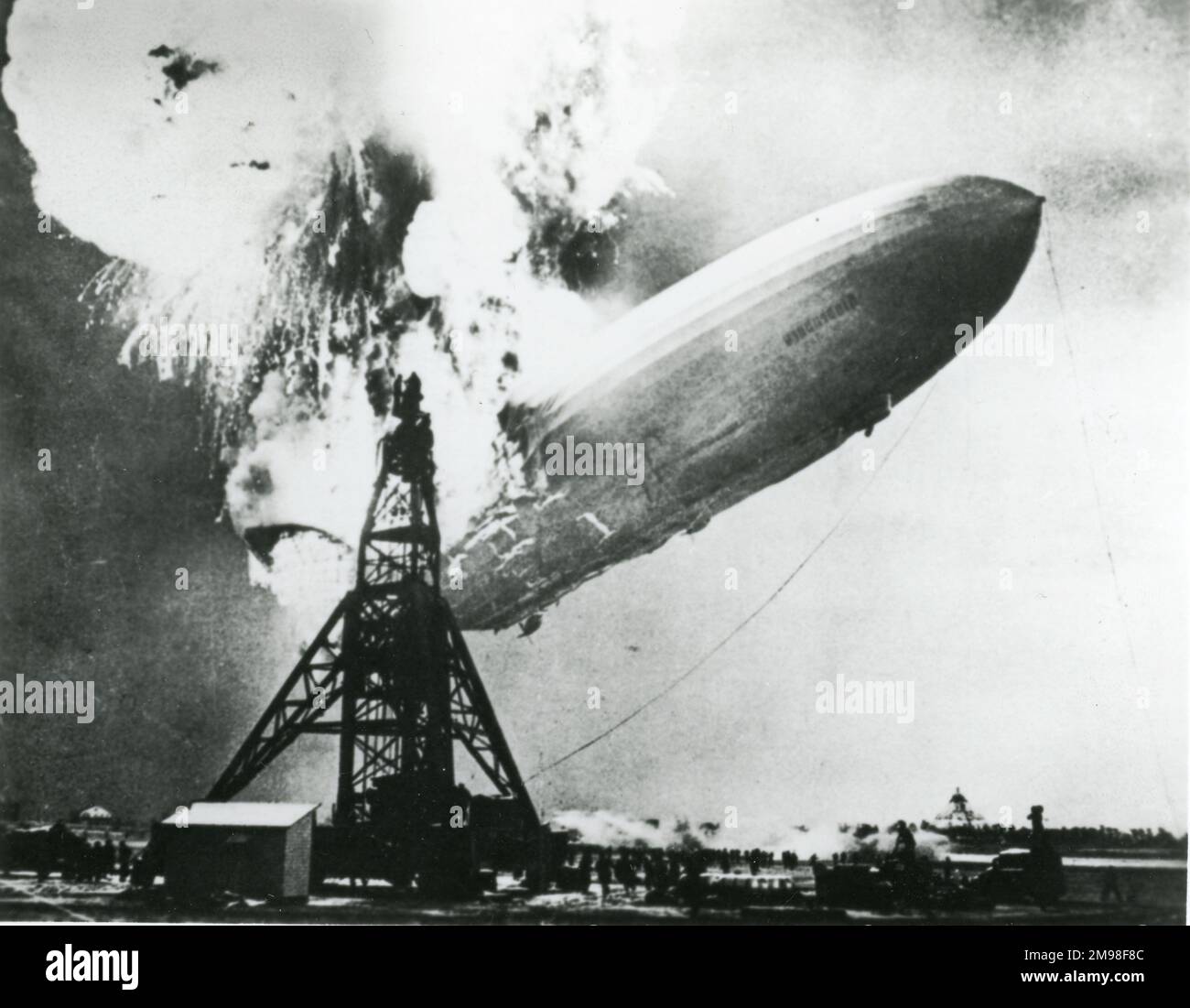 LZ 129 Hindenburg being consumed by fire shortly after arriving at ...