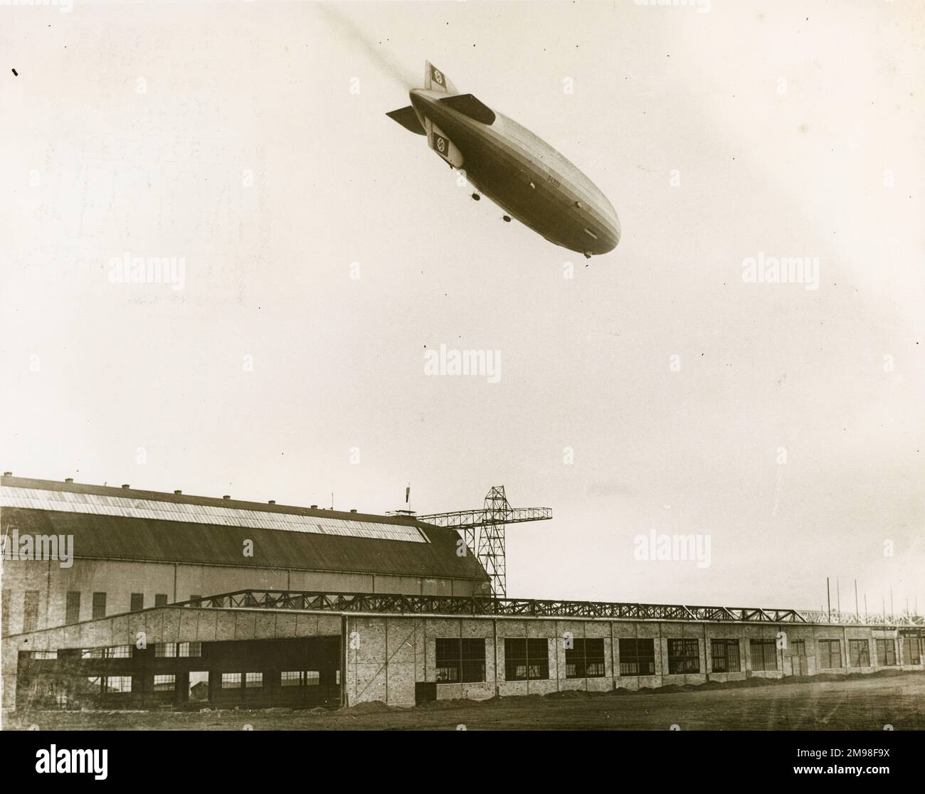 The LZ129 Hindenburg over Friedrichshafen on 4 March 1936, during its ...