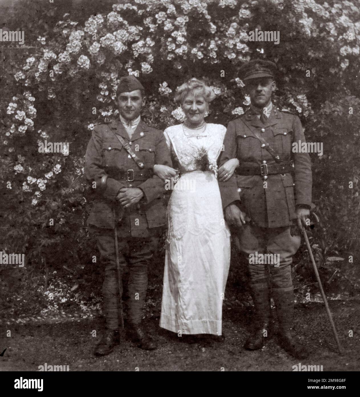 Mother and two sons in a garden, July 1917 -- Ellen Auerbach with her ...